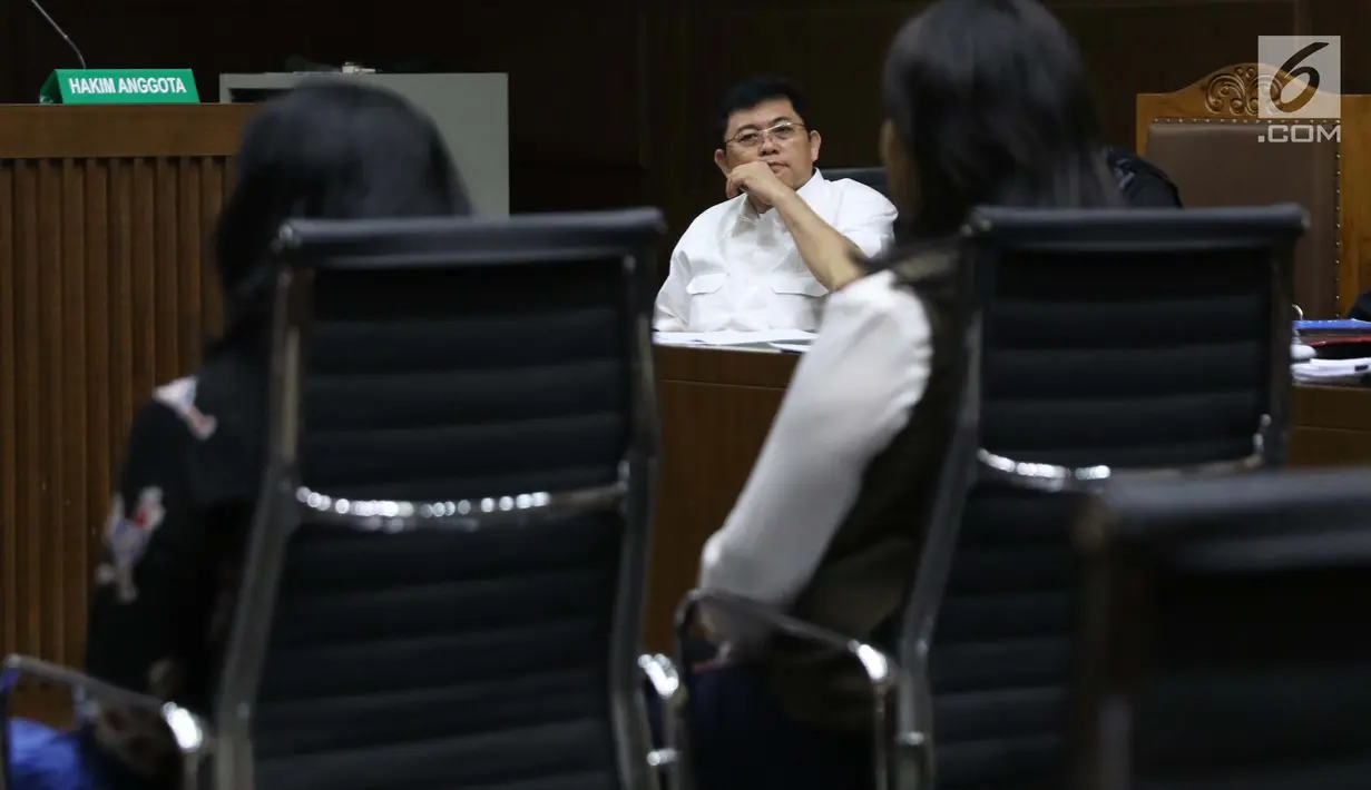 FOTO: Pengacara Lucas Kembali Jalani Sidang Lanjutan - Foto Liputan6.com