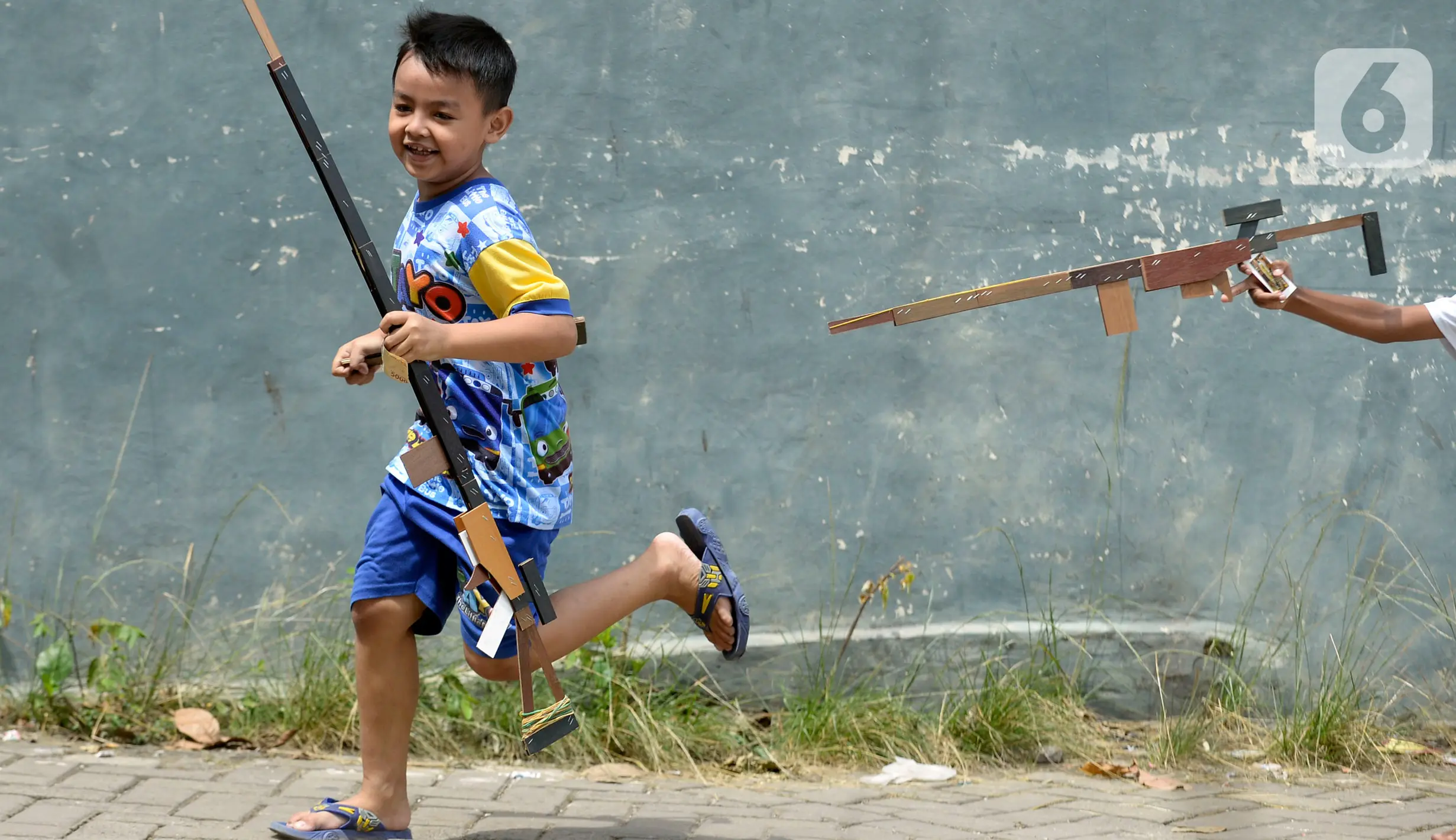 FOTO: Keseruan Anak-Anak Bermain Tembak-tembakan dengan Mainan ...
