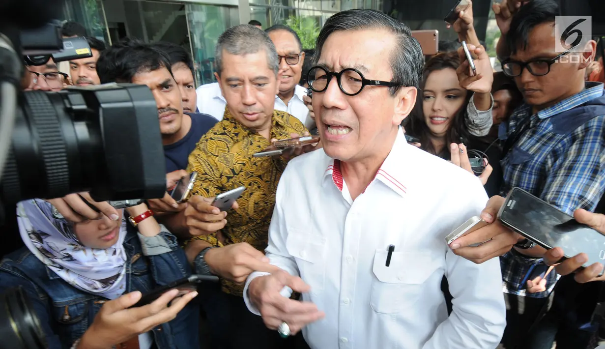 FOTO: Ekspresi Menkumham Yasonna Laoly Usai Diperiksa KPK - Foto Liputan6.com