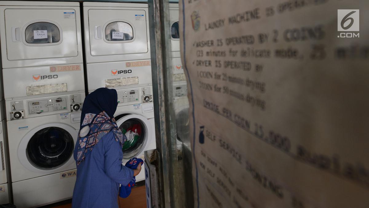 FOTO: ART Mudik Lebaran, Jasa Laundry Jadi Andalan - Foto Liputan6.com