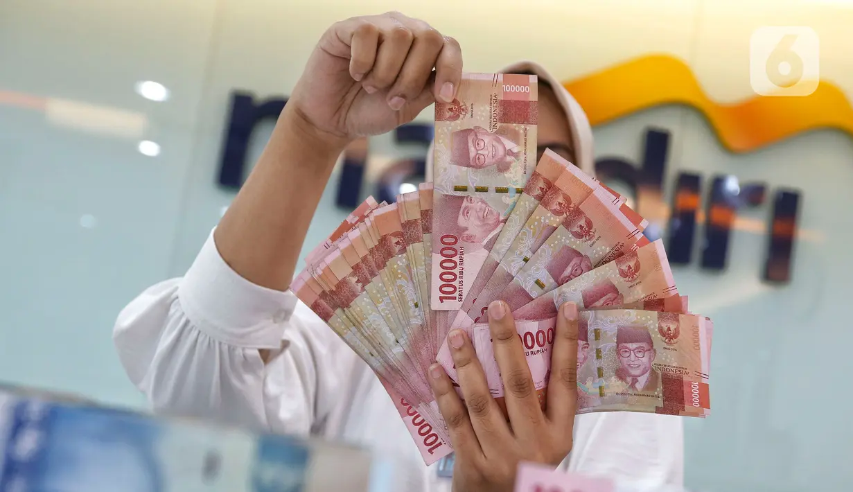Akhir Pekan, Rupiah Melemah Terhadap Dolar - Foto Liputan6.com