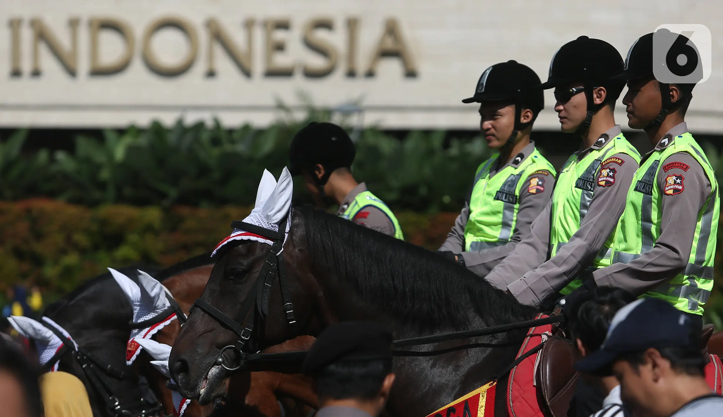 FOTO: Polisi Berkuda Ramaikan CFD Jakarta - Foto Liputan6.com