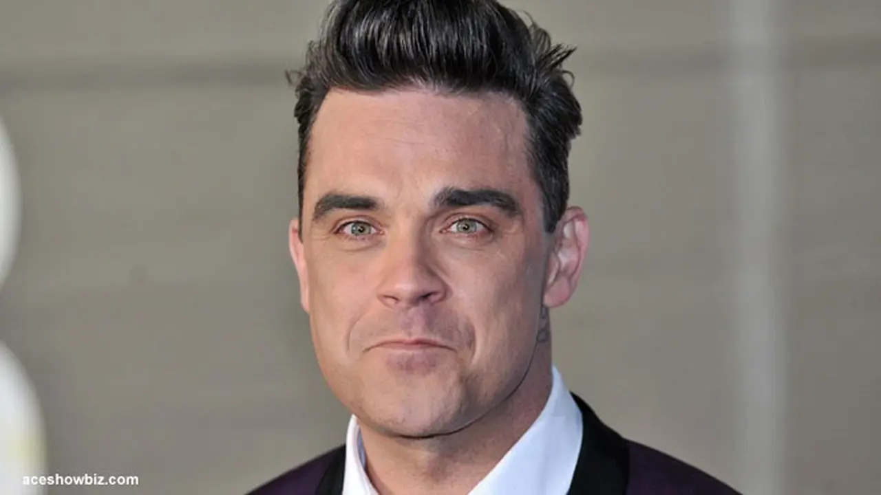 Robbie Williams Serang Brett Anderson Suede - ShowBiz Liputan6.com
